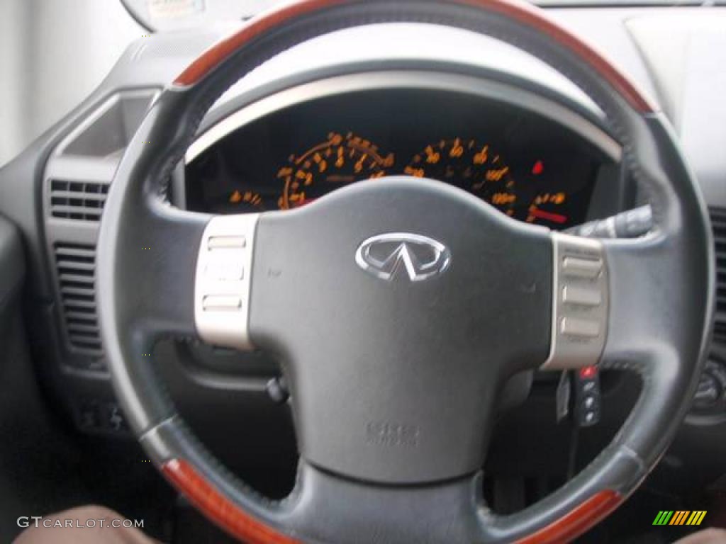 2005 Silver Indulgence Infiniti QX 56 4WD #13895276 Photo #12 | GTCarLot.com - Car Color Galleries